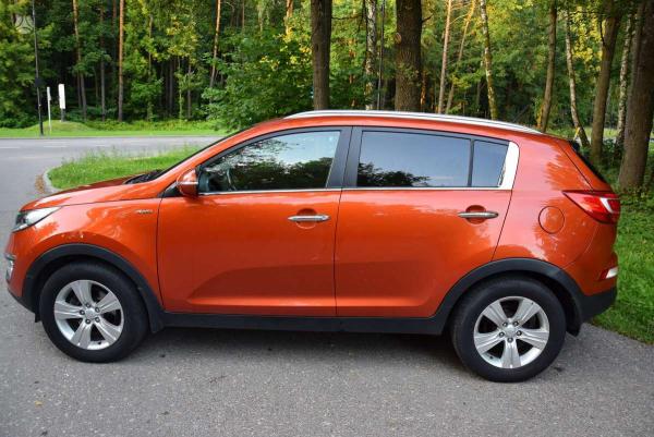 Orange Kia Sportage 2012 in Alytus, with an engine capacity of 2.00 L and mileage of 193 thousand km for 6500 €, photo 4 on AUTOMOTO.COM.LV