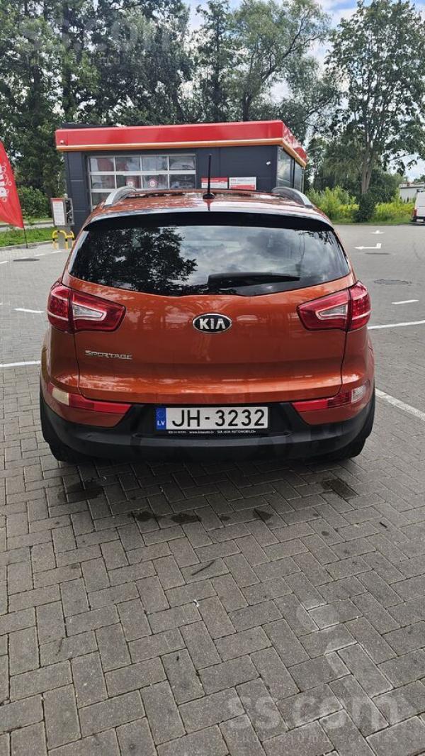 Оранжевый Киа Sportage 2013 в Рига, объемом двигателя 2.00 л и пробегом 110 тыс. км за 9500 €, фото 7 на AUTOMOTO.COM.LV