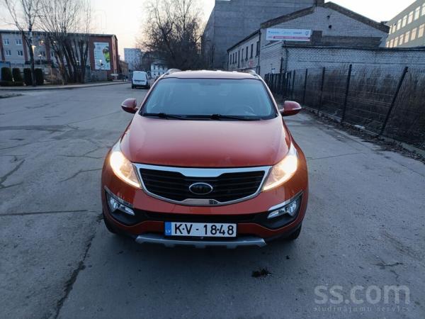 Oranžs Kia Sportage 2013 Rīga, ar dzinēja tilpumu 2.00 L un nobraukumu 247 tūkst. km par 6700 €, foto 2 vietnē AUTOMOTO.COM.LV