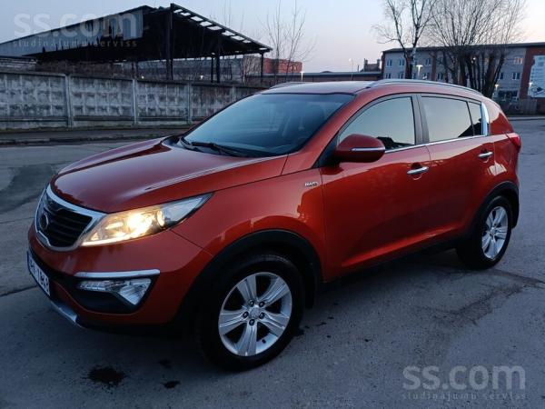 Oranžs Kia Sportage 2013 Rīga, ar dzinēja tilpumu 2.00 L un nobraukumu 247 tūkst. km par 6700 €, foto 3 vietnē AUTOMOTO.COM.LV
