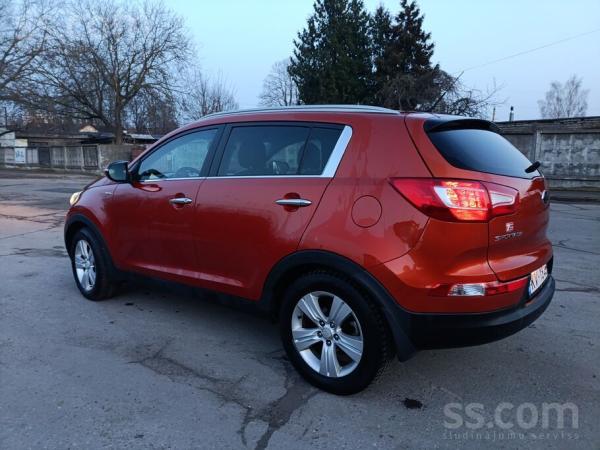 Oranžs Kia Sportage 2013 Rīga, ar dzinēja tilpumu 2.00 L un nobraukumu 247 tūkst. km par 6700 €, foto 6 vietnē AUTOMOTO.COM.LV
