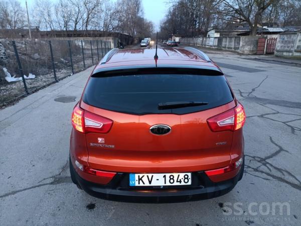 Oranžs Kia Sportage 2013 Rīga, ar dzinēja tilpumu 2.00 L un nobraukumu 247 tūkst. km par 6700 €, foto 7 vietnē AUTOMOTO.COM.LV