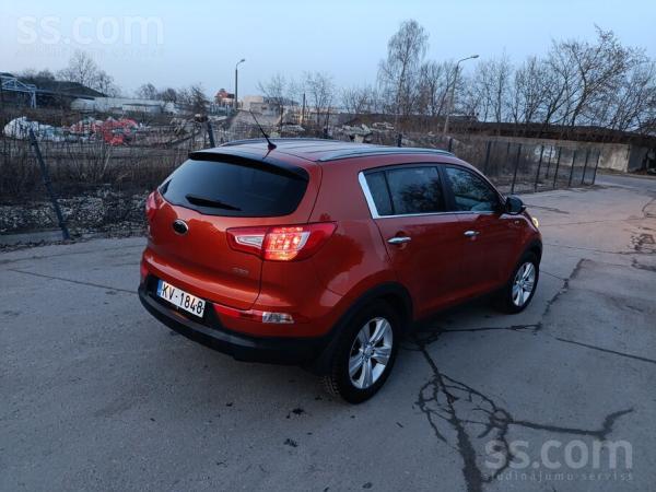Oranžs Kia Sportage 2013 Rīga, ar dzinēja tilpumu 2.00 L un nobraukumu 247 tūkst. km par 6700 €, foto 8 vietnē AUTOMOTO.COM.LV