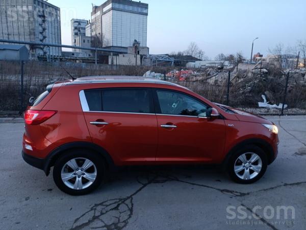 Oranžs Kia Sportage 2013 Rīga, ar dzinēja tilpumu 2.00 L un nobraukumu 247 tūkst. km par 6700 €, foto 9 vietnē AUTOMOTO.COM.LV