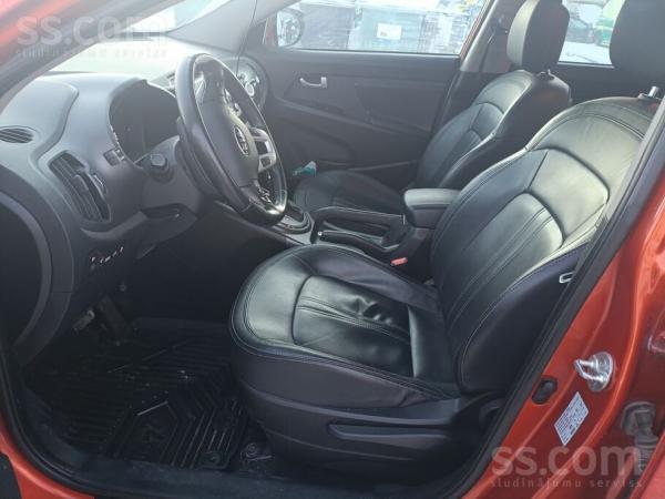 Oranžs Kia Sportage 2013 Rīga, ar dzinēja tilpumu 2.00 L un nobraukumu 247 tūkst. km par 6700 €, foto 10 vietnē AUTOMOTO.COM.LV