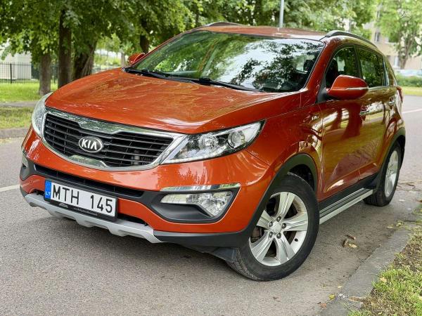 Orange Kia Sportage 2013 in Kaunas, with an engine capacity of 2.00 L and mileage of 207 thousand km for 6300 €, photo 2 on AUTOMOTO.COM.LV