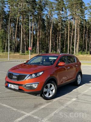 Orange Kia Sportage 2013 in Riga, with an engine capacity of 1.60 L and mileage of 80 thousand km for 6800 €, photo  on AUTOMOTO.COM.LV