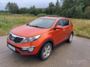 Oranžs Kia Sportage 2013 Preiļi, ar dzinēja tilpumu 1.70 L un nobraukumu 420 tūkst. km par 3900 €, foto  vietnē AUTOMOTO.COM.LV