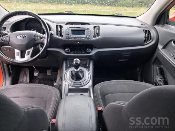 Orange Kia Sportage 2013 in Preili, with an engine capacity of 1.70 L and mileage of 420 thousand km for 3900 €, photo 5 on AUTOMOTO.COM.LV