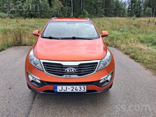 Orange Kia Sportage 2013 in Preili, with an engine capacity of 1.70 L and mileage of 420 thousand km for 3900 €, photo 9 on AUTOMOTO.COM.LV
