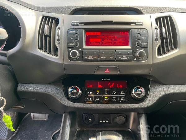 Orange Kia Sportage 2013 in Riga, with an engine capacity of 2.00 L and mileage of 186 thousand km for 6700 €, photo 7 on AUTOMOTO.COM.LV
