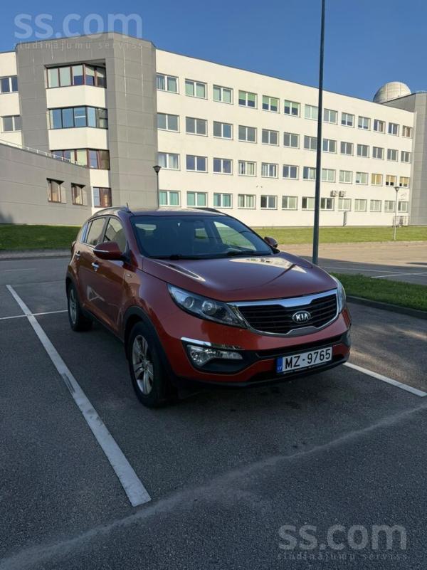 Kia Sportage 2013 Daugavpils vietnē Oranžs Kia Sportage 2013 Daugavpils, ar dzinēja tilpumu 2.00 L un nobraukumu 197 tūkst. km par 7300 €, foto 3 vietnē AUTOMOTO.COM.LV