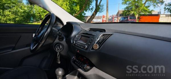 Orange Kia Sportage 2014 in Riga, with an engine capacity of 2.00 L and mileage of 190 thousand km for 8100 €, photo 3 on AUTOMOTO.COM.LV