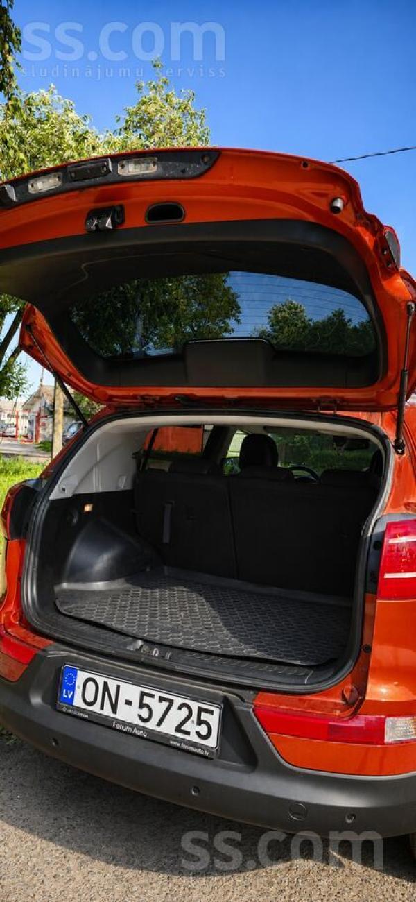Orange Kia Sportage 2014 in Riga, with an engine capacity of 2.00 L and mileage of 190 thousand km for 8100 €, photo 4 on AUTOMOTO.COM.LV