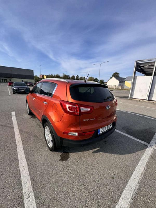 Orange Kia Sportage 2014 in Johvi, with an engine capacity of 0.00 L and mileage of 143 thousand km for 8500 €, photo 1 on AUTOMOTO.COM.LV