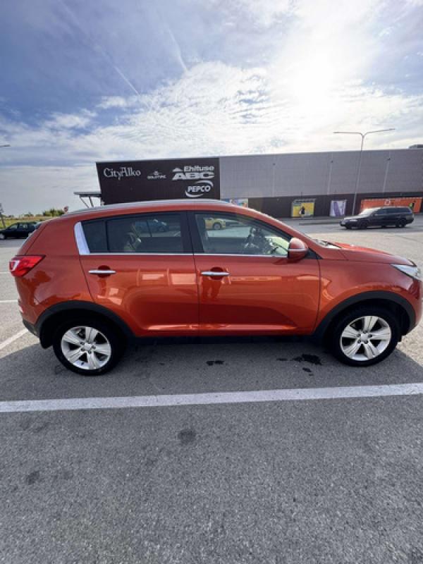 Orange Kia Sportage 2014 in Johvi, with an engine capacity of 0.00 L and mileage of 143 thousand km for 8500 €, photo 2 on AUTOMOTO.COM.LV