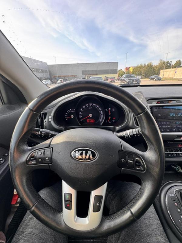 Orange Kia Sportage 2014 in Johvi, with an engine capacity of 0.00 L and mileage of 143 thousand km for 8500 €, photo 6 on AUTOMOTO.COM.LV