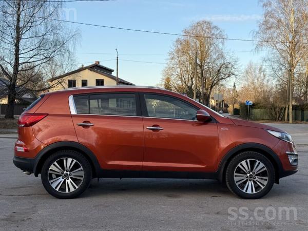 Оранжевый Киа Sportage 2015 в Рига, объемом двигателя 2.00 л и пробегом 67 тыс. км за 10900 €, фото 3 на AUTOMOTO.COM.LV