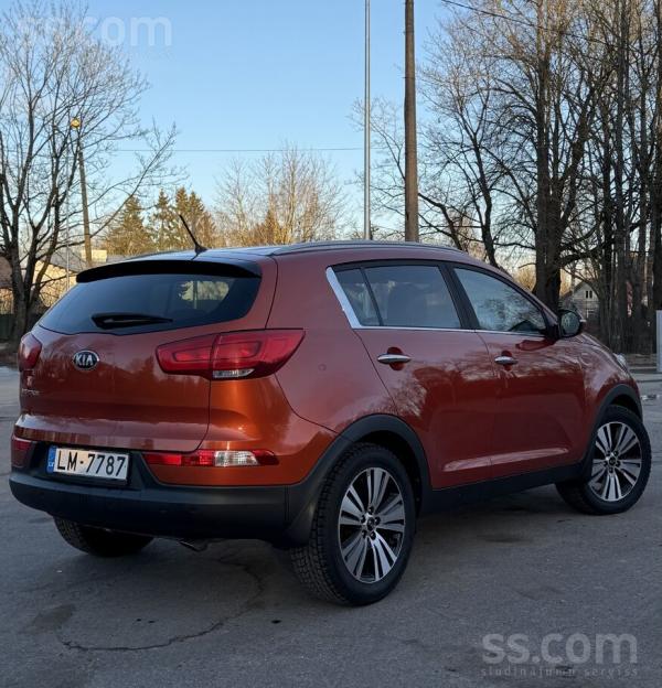 Оранжевый Киа Sportage 2015 в Рига, объемом двигателя 2.00 л и пробегом 67 тыс. км за 10900 €, фото 5 на AUTOMOTO.COM.LV