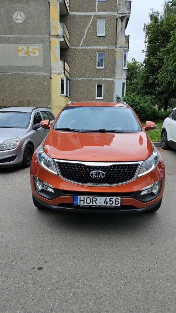 Orange Kia Sportage 2015 in Kaunas, with an engine capacity of 2.00 L and mileage of 104 thousand km for 9700 €, photo 2 on AUTOMOTO.COM.LV