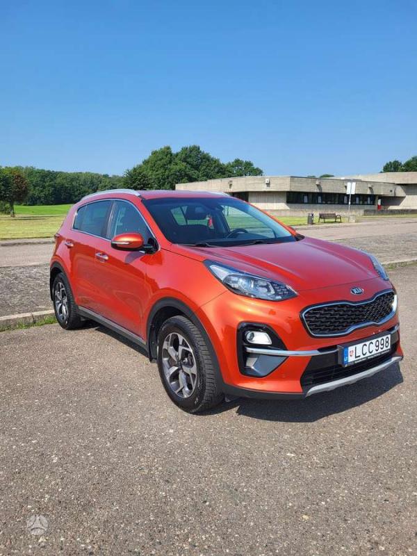 Orange Kia Sportage 2019 in Kaunas, with an engine capacity of 1.59 L and mileage of 85 thousand km for 13900 €, photo 8 on AUTOMOTO.COM.LV