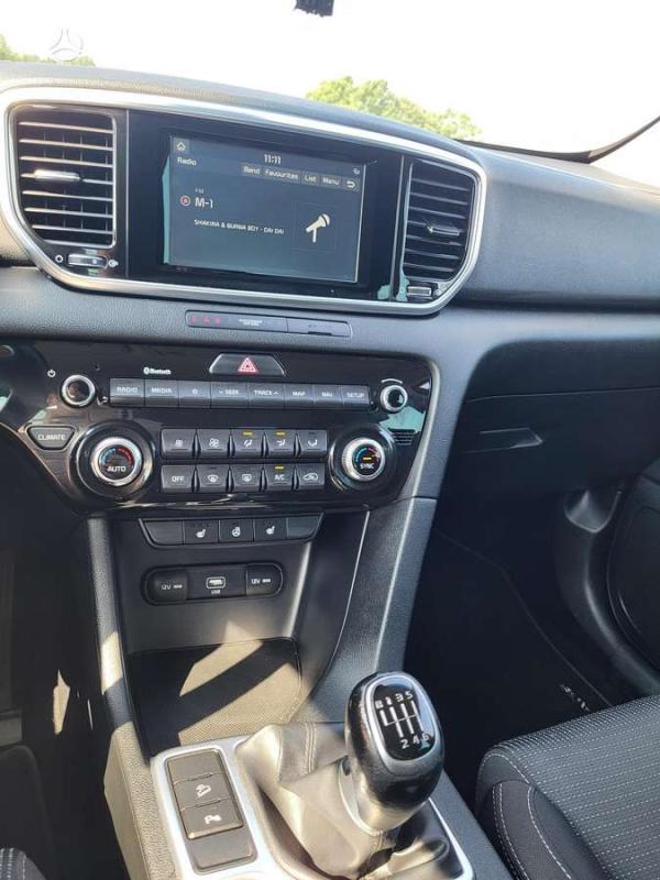 Orange Kia Sportage 2019 in Kaunas, with an engine capacity of 1.59 L and mileage of 85 thousand km for 13900 €, photo 10 on AUTOMOTO.COM.LV