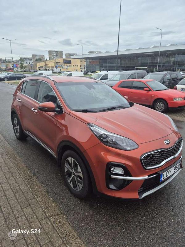 Orange Kia Sportage 2019 in Vilnius, with an engine capacity of 1.60 L and mileage of 114 thousand km for 14300 €, photo 6 on AUTOMOTO.COM.LV