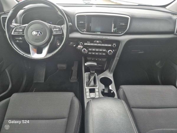 Orange Kia Sportage 2019 in Vilnius, with an engine capacity of 1.60 L and mileage of 114 thousand km for 14300 €, photo 9 on AUTOMOTO.COM.LV
