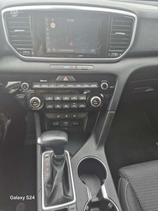Orange Kia Sportage 2019 in Vilnius, with an engine capacity of 1.60 L and mileage of 114 thousand km for 14300 €, photo 11 on AUTOMOTO.COM.LV