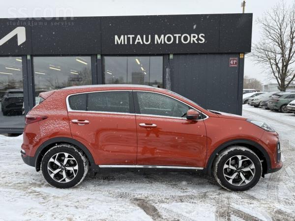 Orange Kia Sportage 2021 in Jelgava, with an engine capacity of 1.60 L and mileage of 133 thousand km for 16300 €, photo 7 on AUTOMOTO.COM.LV