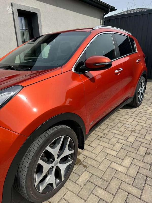 Orange Kia Sportage 2022 in Kaunas, with an engine capacity of 1.59 L and mileage of 51 thousand km for 18500 €, photo 2 on AUTOMOTO.COM.LV