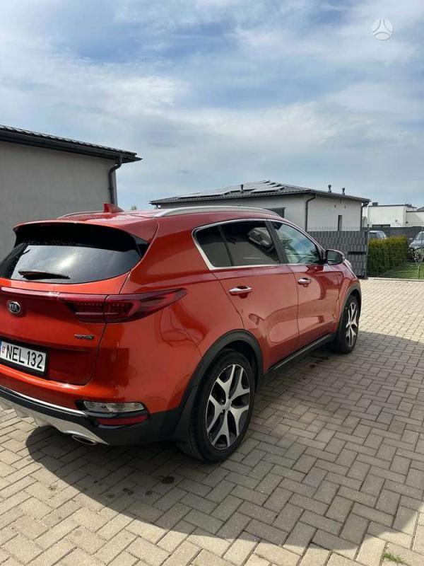 Orange Kia Sportage 2022 in Kaunas, with an engine capacity of 1.59 L and mileage of 51 thousand km for 18500 €, photo 3 on AUTOMOTO.COM.LV