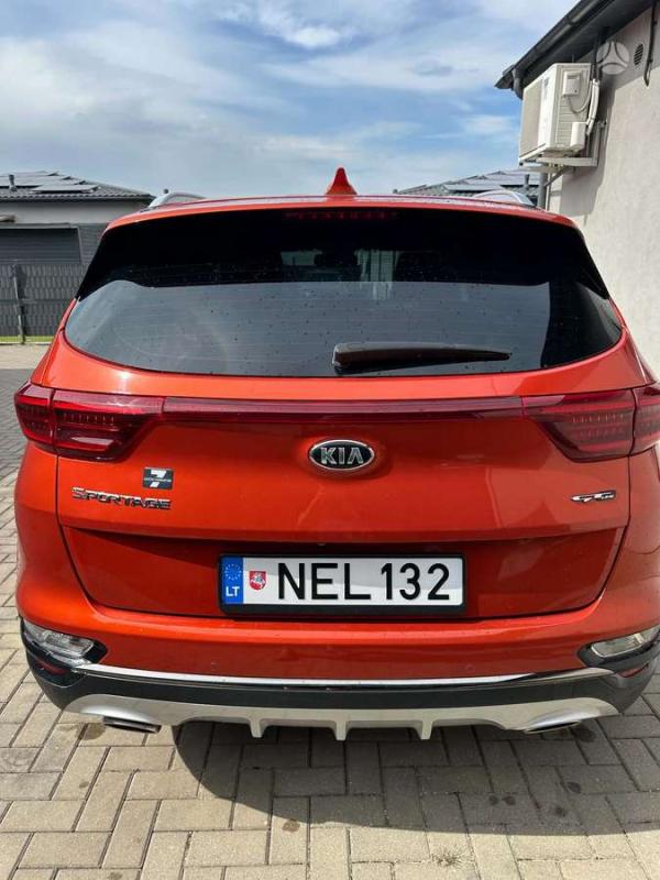 Orange Kia Sportage 2022 in Kaunas, with an engine capacity of 1.59 L and mileage of 51 thousand km for 18500 €, photo 4 on AUTOMOTO.COM.LV