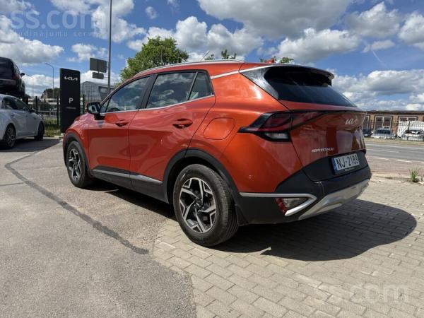 Orange Kia Sportage 2023 in Jelgava, with an engine capacity of 1.60 L and mileage of 103 thousand km for 20500 €, photo 3 on AUTOMOTO.COM.LV