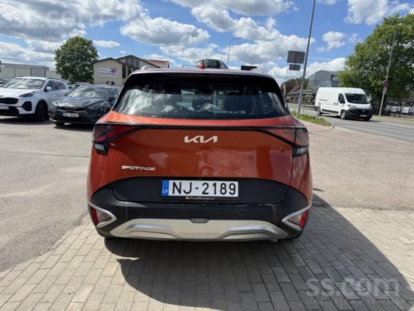 Orange Kia Sportage 2023 in Jelgava, with an engine capacity of 1.60 L and mileage of 103 thousand km for 20500 €, photo 4 on AUTOMOTO.COM.LV