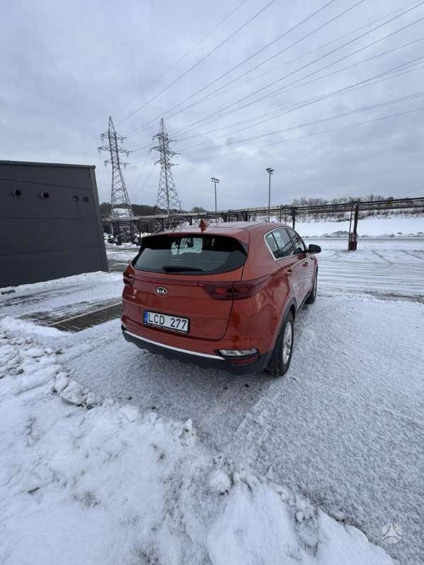 Orange Kia Sportage 2019 in Kaunas, with an engine capacity of 1.60 L and mileage of 103 thousand km for 14200 €, photo 5 on AUTOMOTO.COM.LV