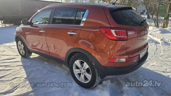 Oranžs Kia Sportage 2011 Tallina, ar dzinēja tilpumu 2.00 L un nobraukumu 280 tūkst. km par 5500 €, foto 3 vietnē AUTOMOTO.COM.LV