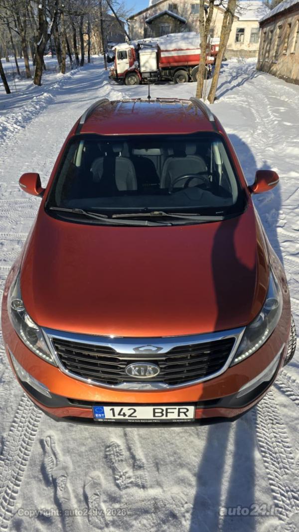 Oranžs Kia Sportage 2011 Tallina, ar dzinēja tilpumu 2.00 L un nobraukumu 280 tūkst. km par 5500 €, foto 5 vietnē AUTOMOTO.COM.LV
