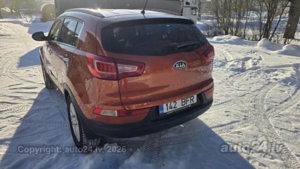 Oranžs Kia Sportage 2011 Tallina, ar dzinēja tilpumu 2.00 L un nobraukumu 280 tūkst. km par 5500 €, foto 6 vietnē AUTOMOTO.COM.LV