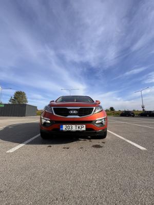 Orange Kia Sportage 2014 in Kohtla-Jarve, with an engine capacity of 2.00 L and mileage of 143 thousand km for 8500 €, photo  on AUTOMOTO.COM.LV