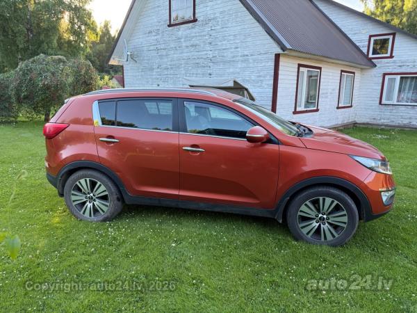 Oranžs Kia Sportage 2015 Repina, ar dzinēja tilpumu 1.70 L un nobraukumu 150 tūkst. km par 7999 €, foto 5 vietnē AUTOMOTO.COM.LV