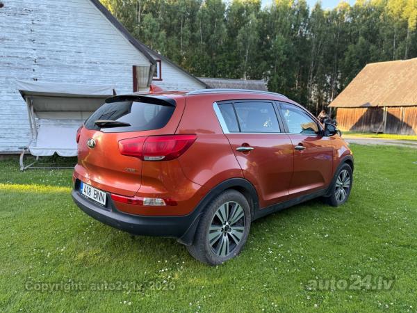 Oranžs Kia Sportage 2015 Repina, ar dzinēja tilpumu 1.70 L un nobraukumu 150 tūkst. km par 7999 €, foto 6 vietnē AUTOMOTO.COM.LV