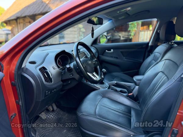 Oranžs Kia Sportage 2015 Repina, ar dzinēja tilpumu 1.70 L un nobraukumu 150 tūkst. km par 7999 €, foto 10 vietnē AUTOMOTO.COM.LV