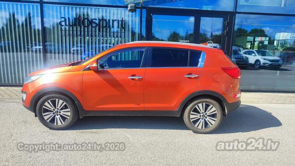 Orange Kia Sportage 2015 in Tallinn, with an engine capacity of 1.70 L and mileage of 153 thousand km for 8490 €, photo 2 on AUTOMOTO.COM.LV