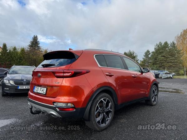 Orange Kia Sportage 2021 in Tartu, with an engine capacity of 1.60 L and mileage of 135 thousand km for 20900 €, photo 11 on AUTOMOTO.COM.LV