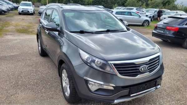 Sarkans Kia Sportage 2013 Telšiai, ar dzinēja tilpumu 1.69 L un nobraukumu 300 tūkst. km par 4950 €, foto 1 vietnē AUTOMOTO.COM.LV