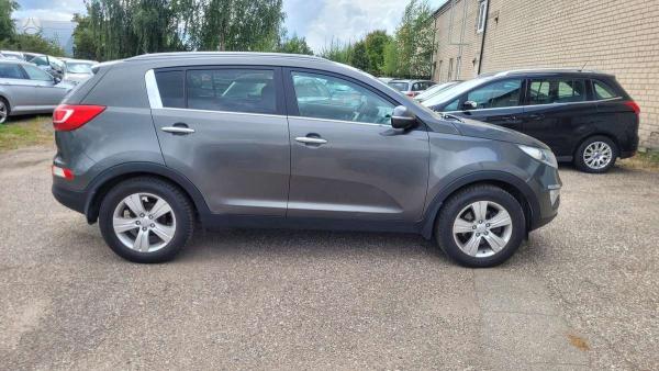 Sarkans Kia Sportage 2013 Telšiai, ar dzinēja tilpumu 1.69 L un nobraukumu 300 tūkst. km par 4950 €, foto 6 vietnē AUTOMOTO.COM.LV
