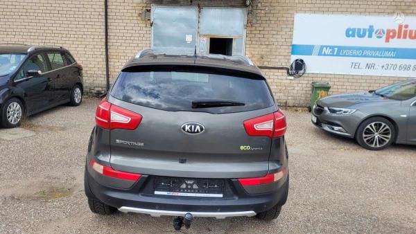 Sarkans Kia Sportage 2013 Telšiai, ar dzinēja tilpumu 1.69 L un nobraukumu 300 tūkst. km par 4950 €, foto 8 vietnē AUTOMOTO.COM.LV