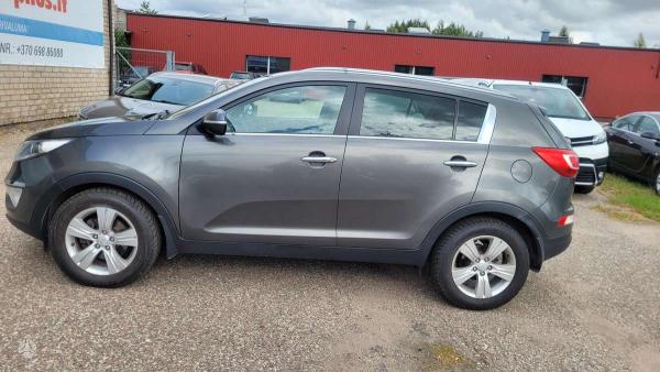 Sarkans Kia Sportage 2013 Telšiai, ar dzinēja tilpumu 1.69 L un nobraukumu 300 tūkst. km par 4950 €, foto 11 vietnē AUTOMOTO.COM.LV