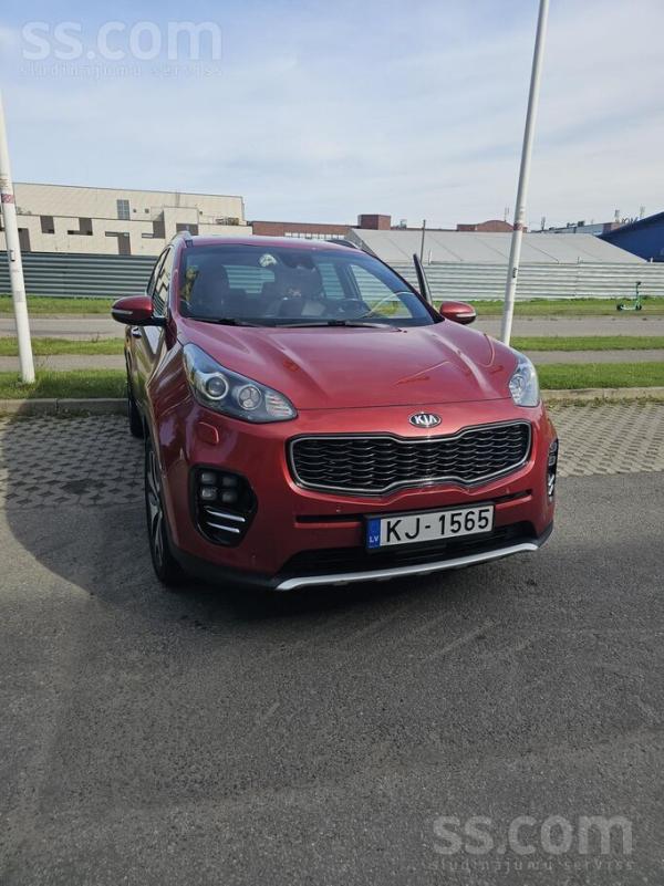 Red Kia Sportage 2016 in Riga, with an engine capacity of 1.60 L and mileage of 173 thousand km for 13900 €, photo 1 on AUTOMOTO.COM.LV